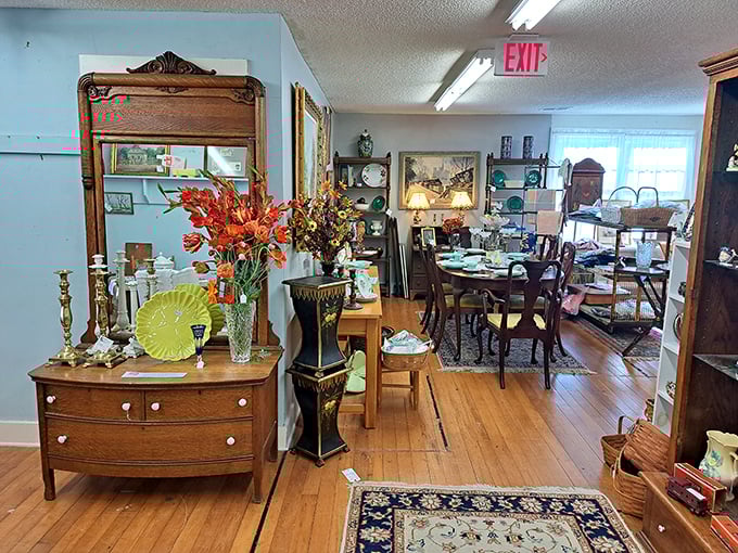 Wooden floors creak beneath your feet as you navigate past antique furniture that's witnessed decades of family dinners and living room conversations.