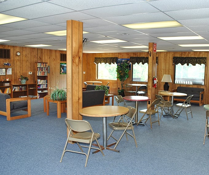 The community lodge – where strangers become friends over coffee, board games, and tales of "the one that got away."