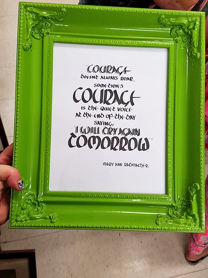 Courage in a lime green frame—proof that inspiration and home decor can both be found for less than the price of a fancy coffee.