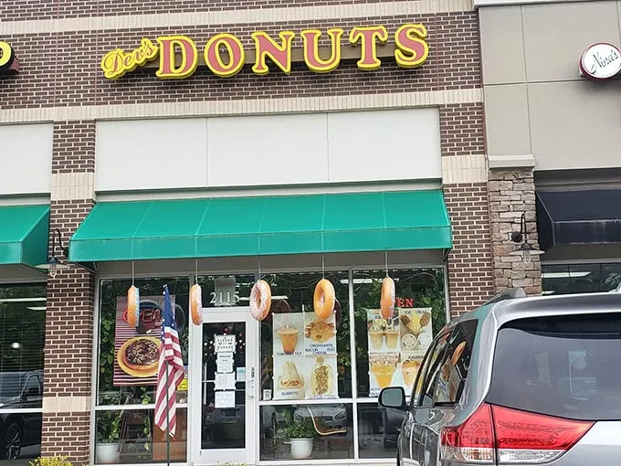 Dev's Donuts keeps it simple with a clean brick storefront. Like a secret club where the password is "glazed with sprinkles, please."