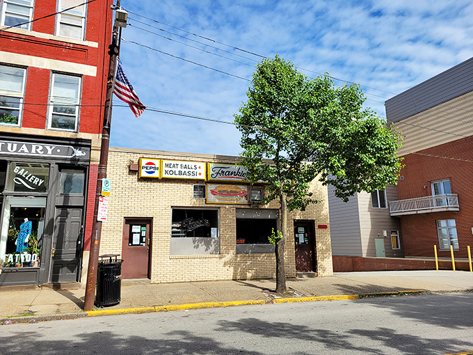 "Meatballs & Kolbassi" might be on the sign, but locals know Frankie's Extra Long hot dogs are the real headliners in this Pittsburgh institution.