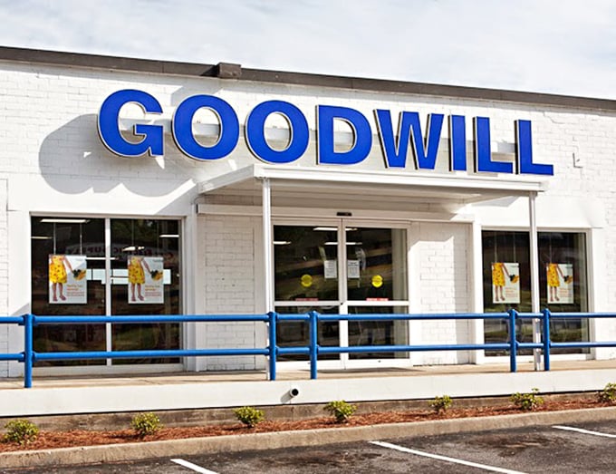 The iconic blue Goodwill sign – where one person's "I'm done with this" becomes another's "I can't believe I found this!"