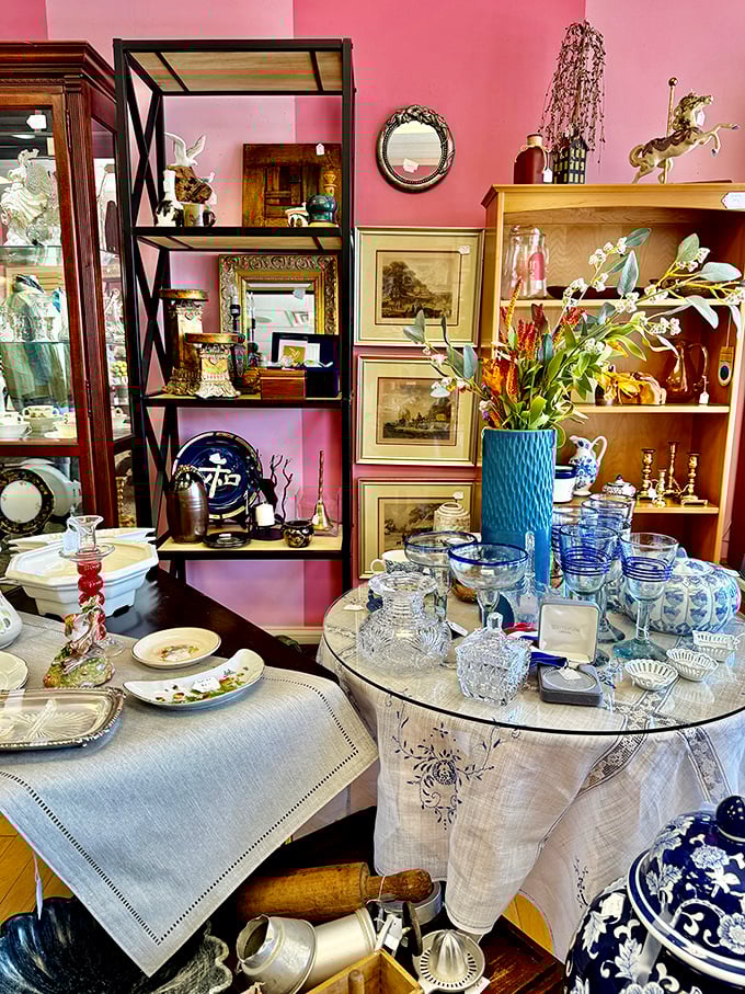 Pink walls and crystal displays create an elegant atmosphere that elevates thrift shopping to art form.