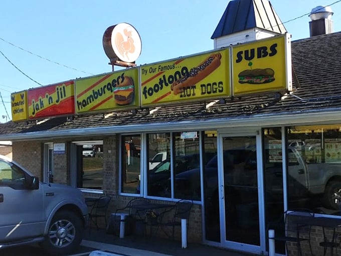Those bright yellow signs aren't just decoration – they're a promise that foot-long happiness awaits inside Jak'n Jil.
