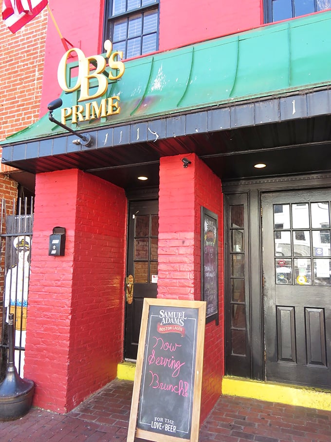 OB's Prime's vibrant red facade stands out on Main Street like a juicy steak on a white plate—impossible to ignore, impossible to forget.