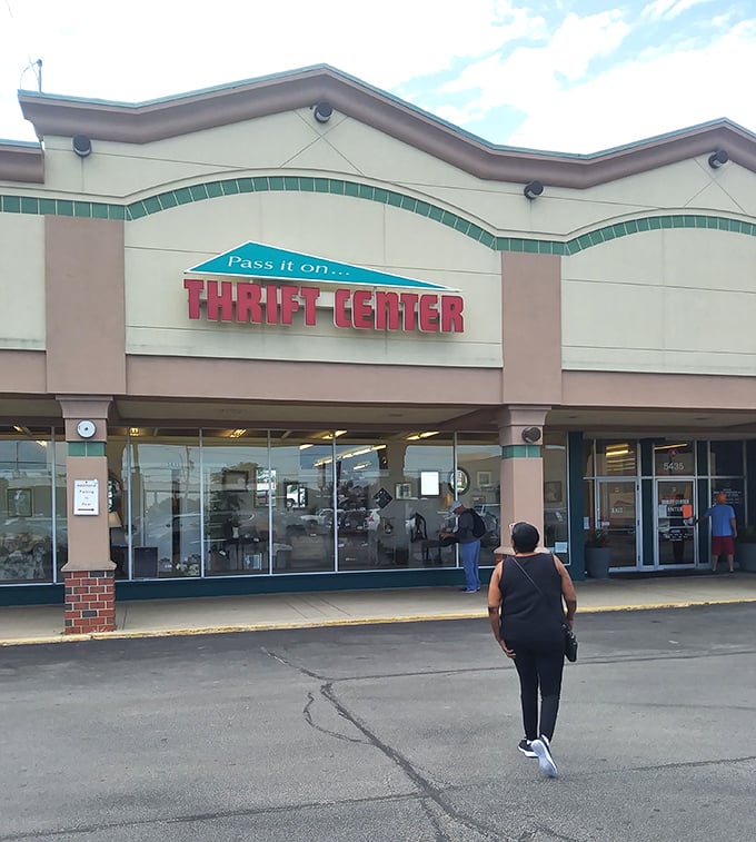 Pass It On's cheerful exterior welcomes shoppers to discover pre-loved treasures at wallet-friendly prices.