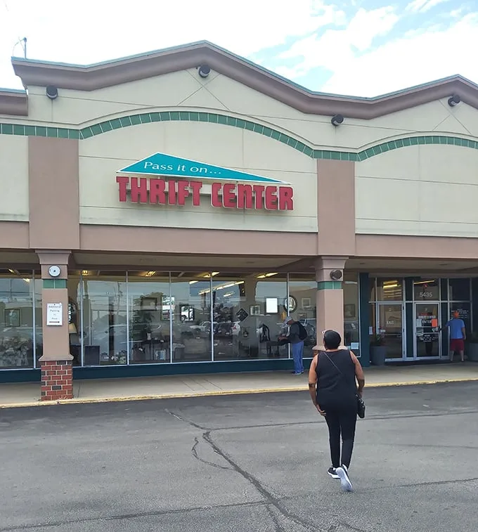Pass It On's cheerful exterior welcomes shoppers to discover pre-loved treasures at wallet-friendly prices.