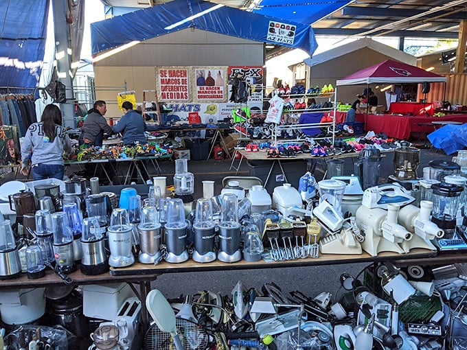 Blenders, toasters, and kitchen gadgets galore! This vendor's table is a time capsule of American household innovation.