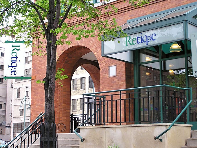 This elegant brick entrance makes thrift shopping feel like visiting a sophisticated downtown boutique experience.