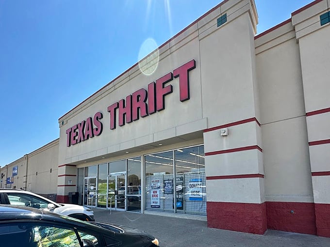 Texas Thrift's bold red signage stands out like a neon promise of bargains waiting to be discovered.