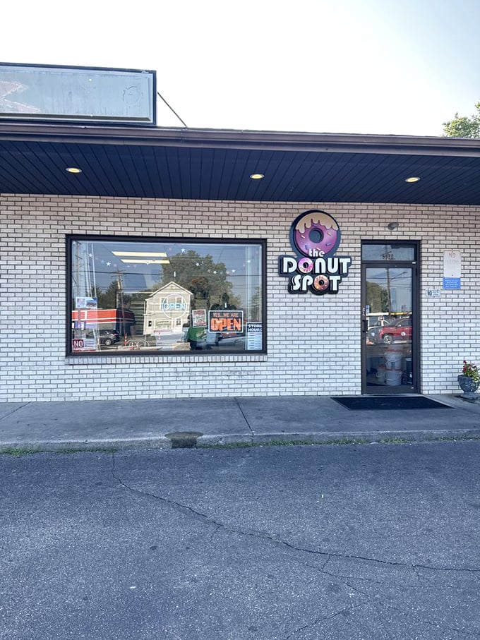 The Donut Spot's simple storefront whispers what flashier places shout – sometimes quiet confidence makes the loudest statement.