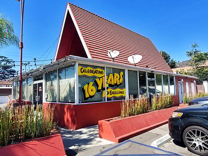 That distinctive red roof signals serious sandwich business – where comfort food meets California's culinary creativity.