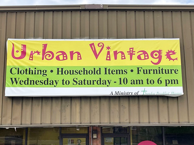Urban Vintage’s bright storefront sign welcomes shoppers to explore a boutique-style thrift shop filled with clothing, furniture, and household treasures.