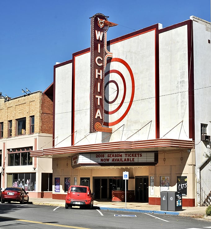 The iconic Wichita Theater stands tall in downtown Wichita Falls, its vintage marquee lighting up the night like it has for generations.