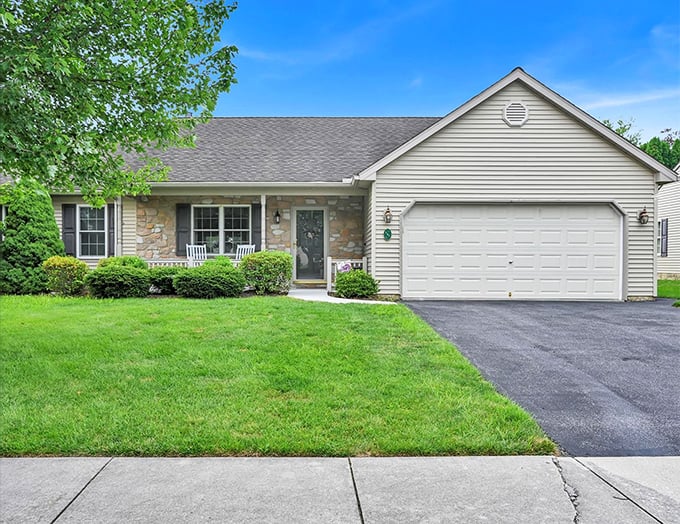 Stone accents and covered porches - it's like Mayberry got a sensible makeover. 