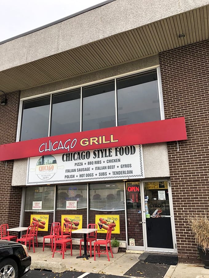 Simple storefront, serious pizza credentials – sometimes the best food needs no fancy packaging.