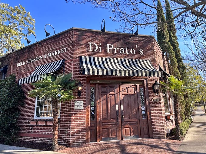 DiPrato's brick exterior whispers "authentic deli" while the striped awning shouts "come hungry!" 