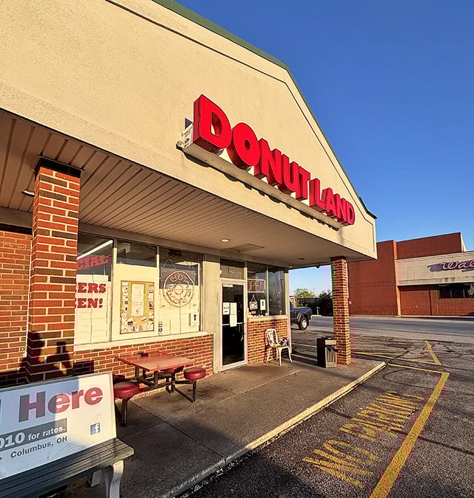 That red signage isn't just eye-catching, it's a beacon calling all donut lovers to their happy place.