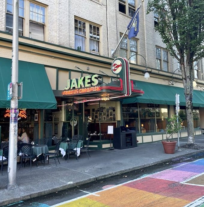 Green awnings and sidewalk seating that whispers, "Yes, you should absolutely play hooky from work for a long lunch here."