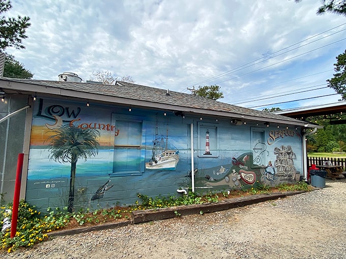 Behind that colorful mural lies a seafood sanctuary where tradition meets perfection on every plate.