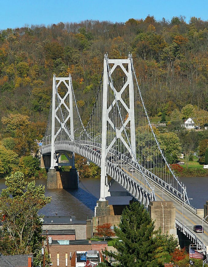 The iconic Simon Kenton Bridge in Maysville spans the Ohio River, connecting residents to scenic views and budget-friendly living.