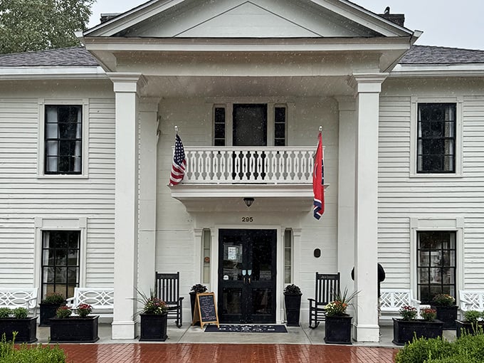 The American flag flutters above Miss Mary Bobo's like it's saying "this is what America tastes like." Historic charm, legendary chicken.