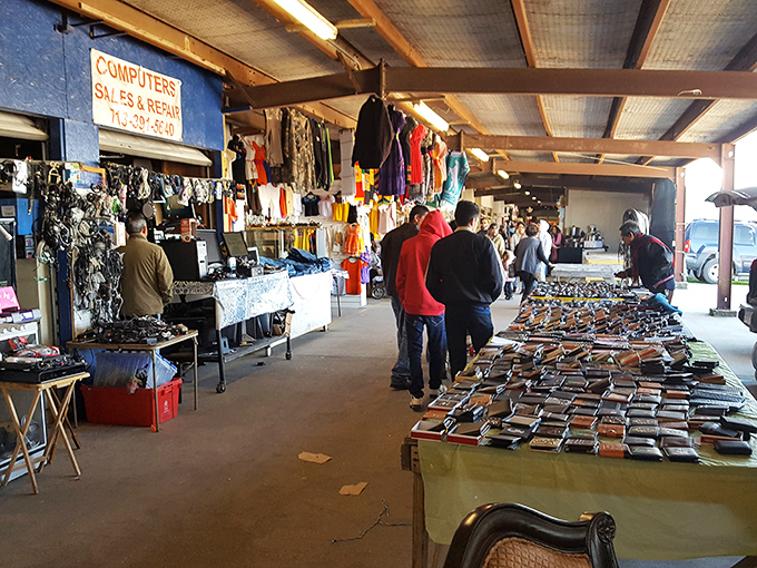 Books, tools, and treasures spread across tables like a buffet of possibilities for every type of collector.