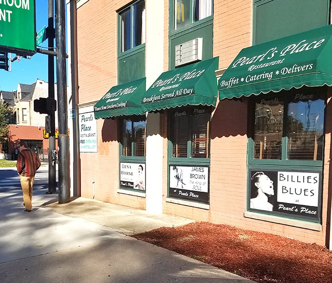 Green awnings and brick walls frame decades of soul food excellence on Michigan Avenue.