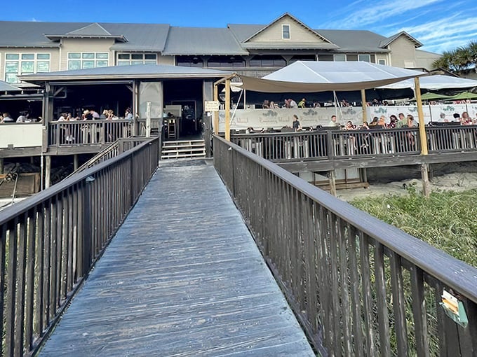The walkway beckons! This wooden bridge leads to The Waterfront's bay-view dining where spotting manatees between courses is just part of the experience.