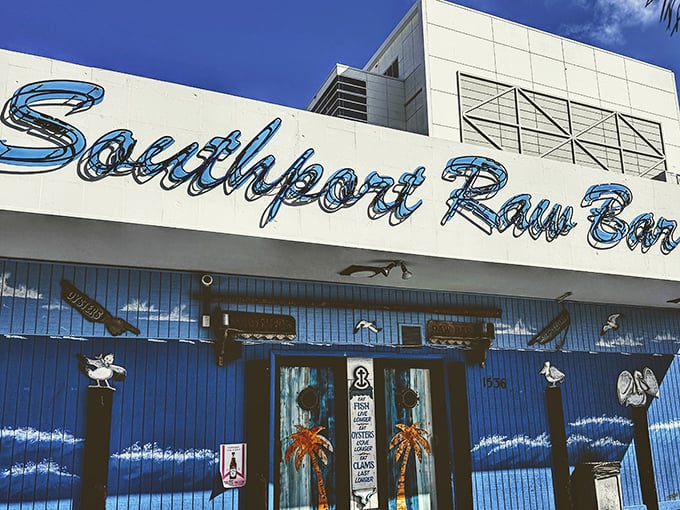 The neon-blue sign says it all – at Southport Raw Bar, seafood isn't just a meal, it's a way of life.