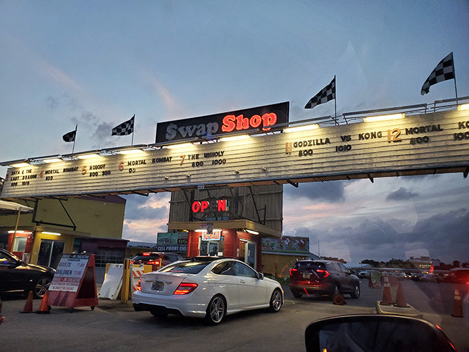 As evening falls, this unique venue transforms from shopping destination to drive-in movie magic under stars.