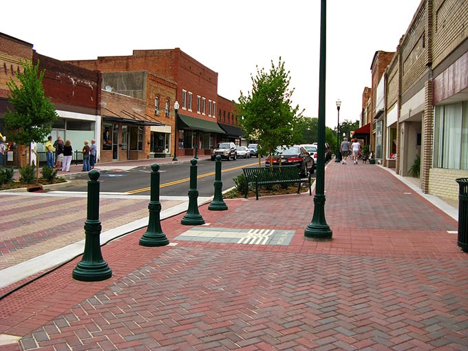 That brick sidewalk has probably heard more gossip than a church parking lot on Sunday afternoon. 