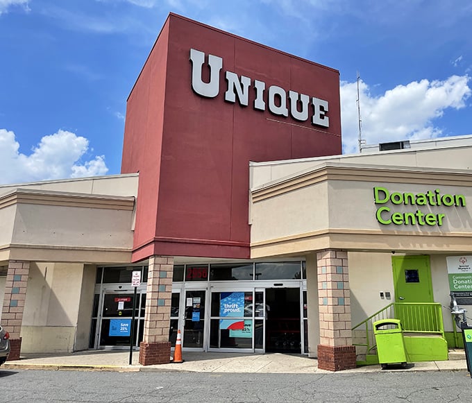 The red tower announces this thrift destination like a lighthouse guiding treasure seekers home.