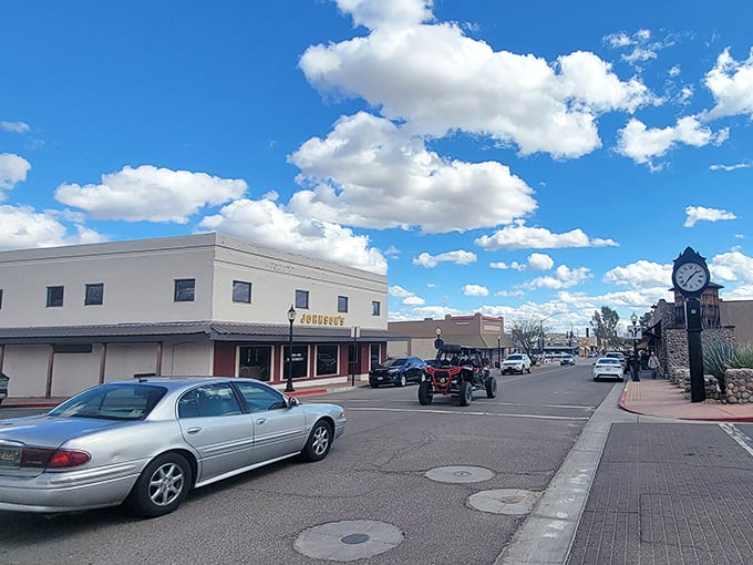 Main Street stretches toward desert horizons where cowboys once rode and legends were born under endless skies.
