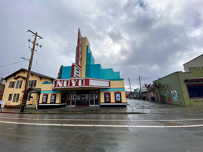 Rainy day matinee vibes! The Noyo Theatre's art deco splendor pops against Willits' gray skies like a Technicolor dream in a black-and-white world.