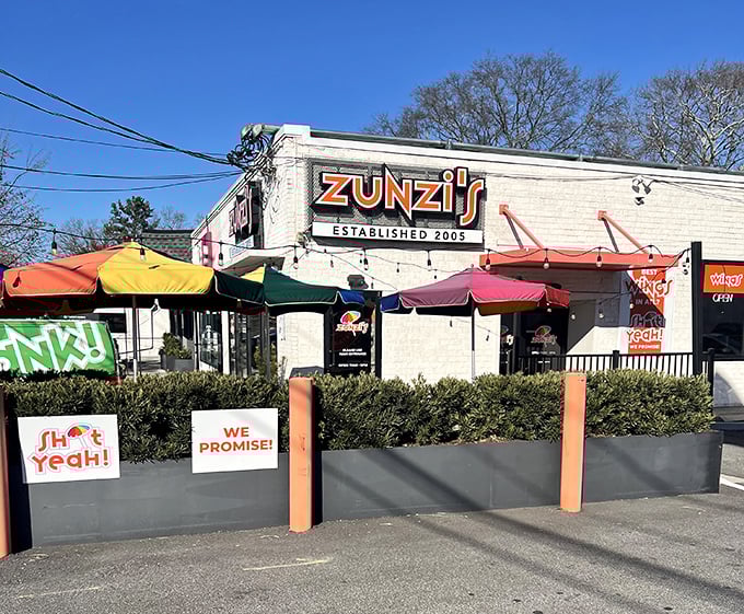 "Sh*t Yeah!" isn't just their sauce name—it's what you'll say after one bite at Zunzi's vibrant Atlanta outpost.