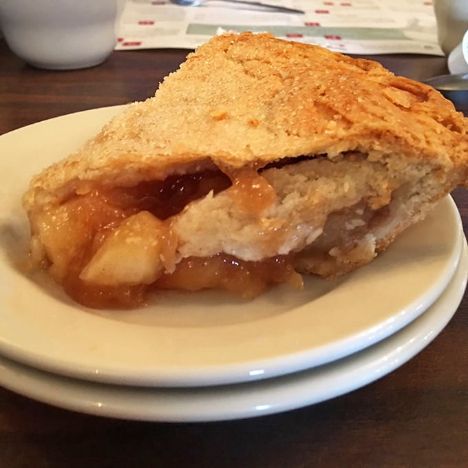 This apple pie isn't just dessert—it's edible architecture with perfectly balanced sweet-tart filling that would make your grandmother both proud and jealous.
