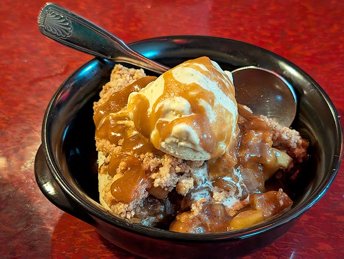 Forget fancy plating and deconstructed desserts. This apple cobbler with ice cream and caramel sauce is comfort in a bowl—the kind that makes you want to hug the chef.