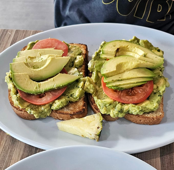 Avocado toast that makes millennials' housing decisions seem reasonable. These vibrant slices are Florida sunshine on artisanal bread.