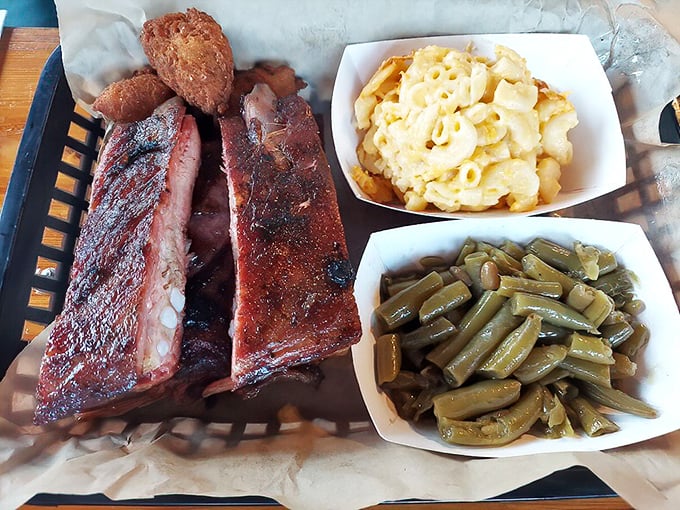 Ribs with that perfect smoke ring, mac and cheese that's actually cheesy, and green beans that haven't been cooked into submission—the barbecue trifecta.