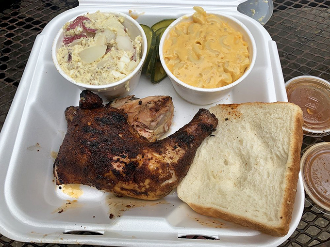 This chicken didn't just meet smoke—they had a long, meaningful relationship. The mac and cheese is their love child.