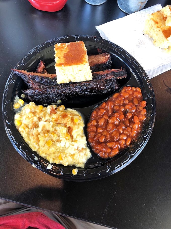 Ribs, cornbread, beans, and corn casserole—a barbecue quartet that performs in perfect harmony. The dark bark on those ribs is nature's candy.