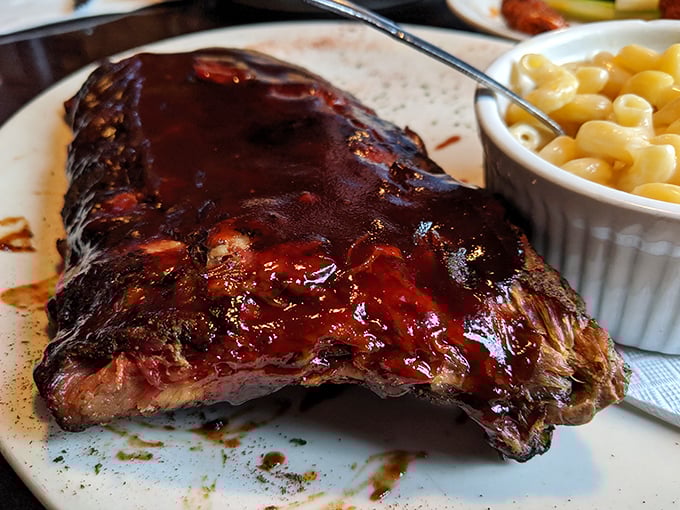 These ribs don't just fall off the bone – they practically leap into your mouth, glazed with a sauce that balances sweet and tangy notes perfectly.