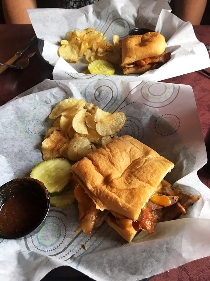 Two sandwiches that prove Michigan understands the universal language of "stuff good things between bread." The pickle is just showing off.