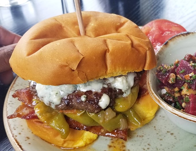 The burger that launched a thousand road trips. Those pickles aren't just garnish—they're essential supporting actors in this meaty drama.