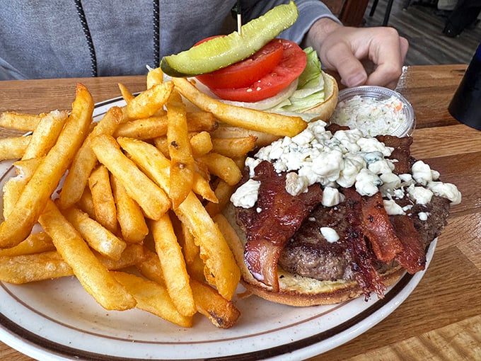 When bacon meets beef and cheese joins the party, you get a burger that understands the true meaning of American friendship.