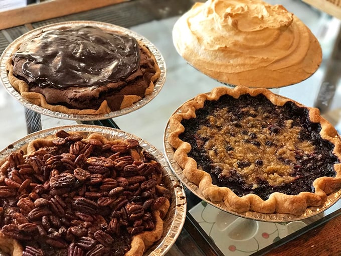 The pie quartet that could make a grown person cry tears of joy. That pecan masterpiece in the corner is calling your name.