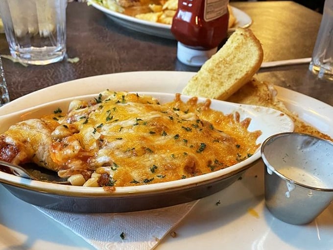 Cheese bubbling over pasta like molten gold – comfort food elevated to an art form without losing its soul-satisfying essence.