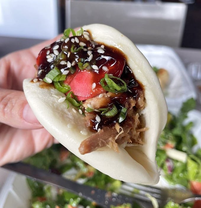 This bao bun doesn't just melt in your mouth—it stages a flavor revolution complete with the perfect balance of savory filling and pillowy dough.