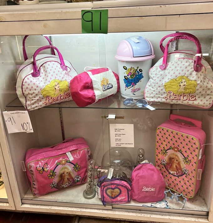 Barbie's vintage accessories collection—proof that fashion sense and pink have been inseparable companions since the 1960s.